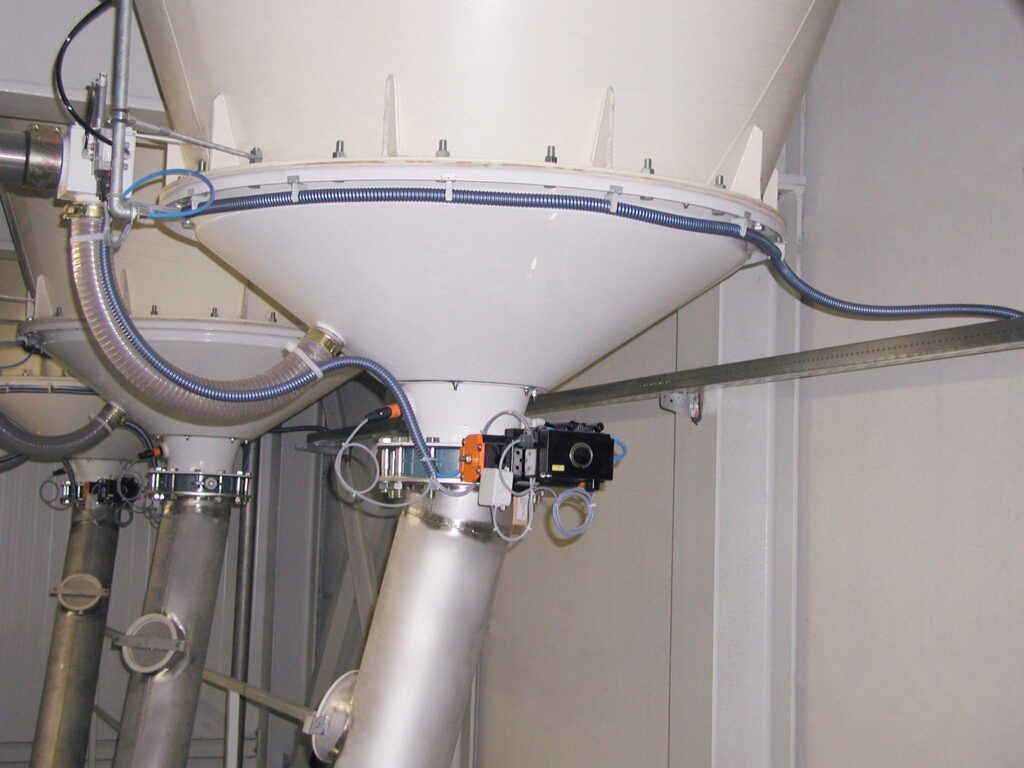 Fluidizing bin discharger - DAXNER